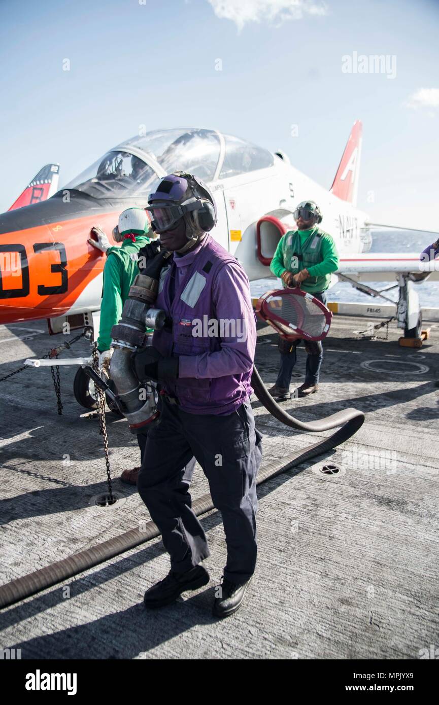 Aviation Boatswain's Mate Fuels 3rd Class prepares to refuel a T-45C ...