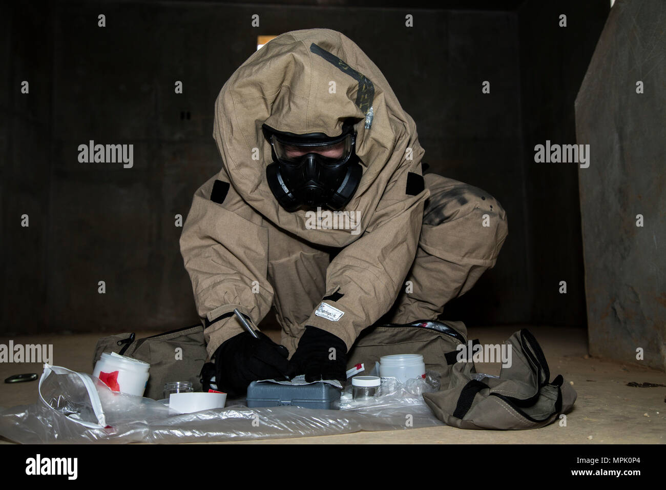 U.S. Marine Corps Cpl. James Dietrich, Sampling Team Leader, with ...