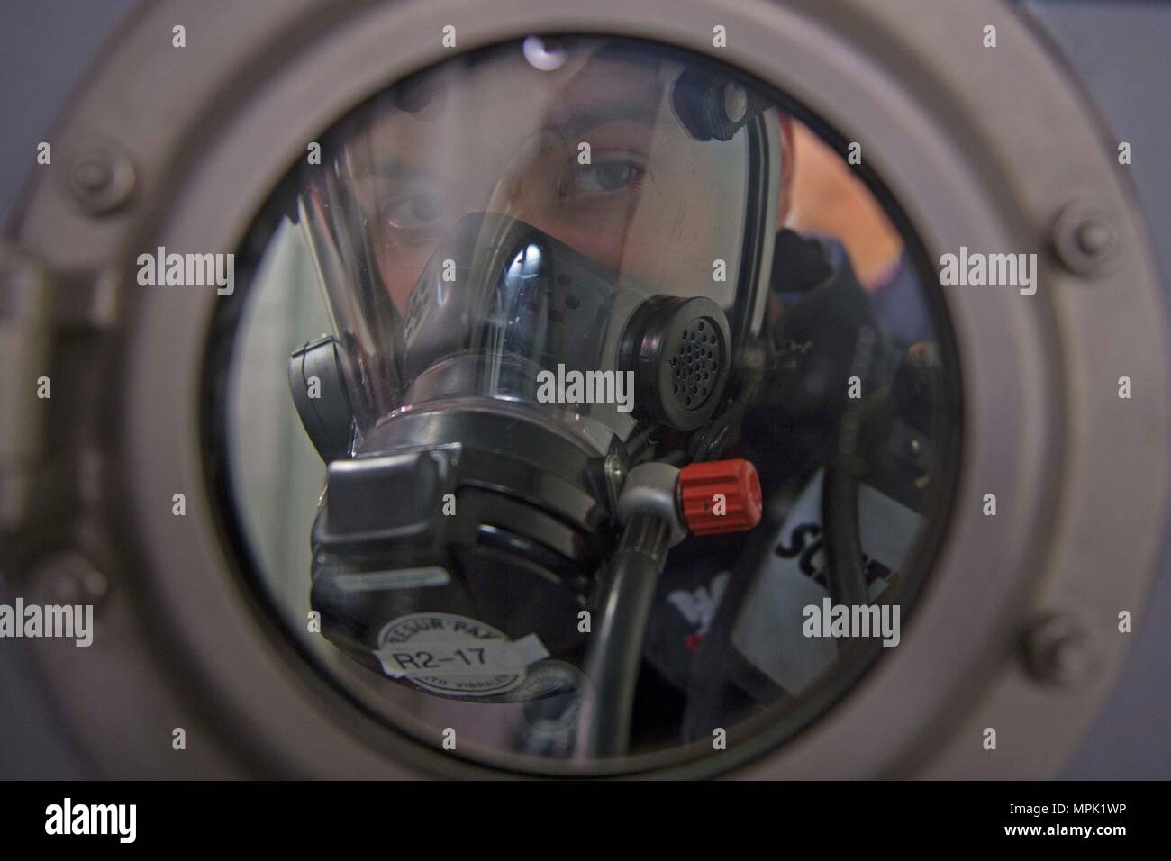 RED SEA (March 14, 2017) Damage Controlman 2nd Class Alex Leblanc sets ...