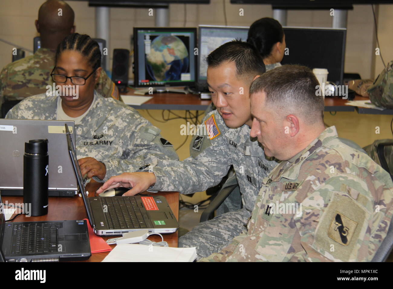 Capt. Gary Moore and Capt. Richard Lam, both of HHC, Southern Division ...
