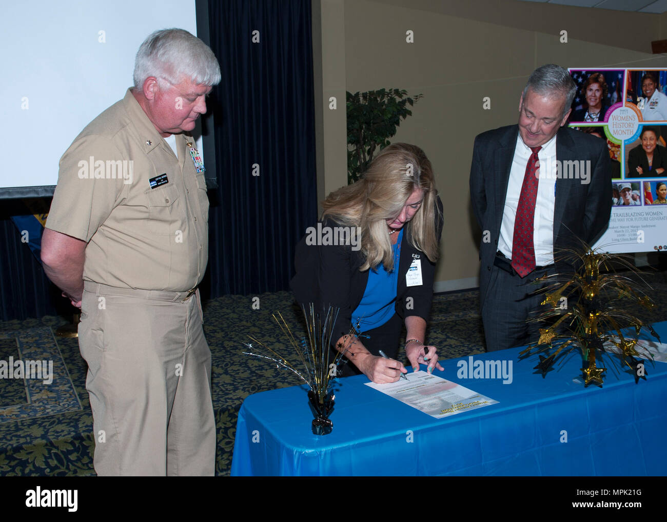 PANAMA CITY, Florida - City of Lynn Haven Mayor Margo Anderson signs ...