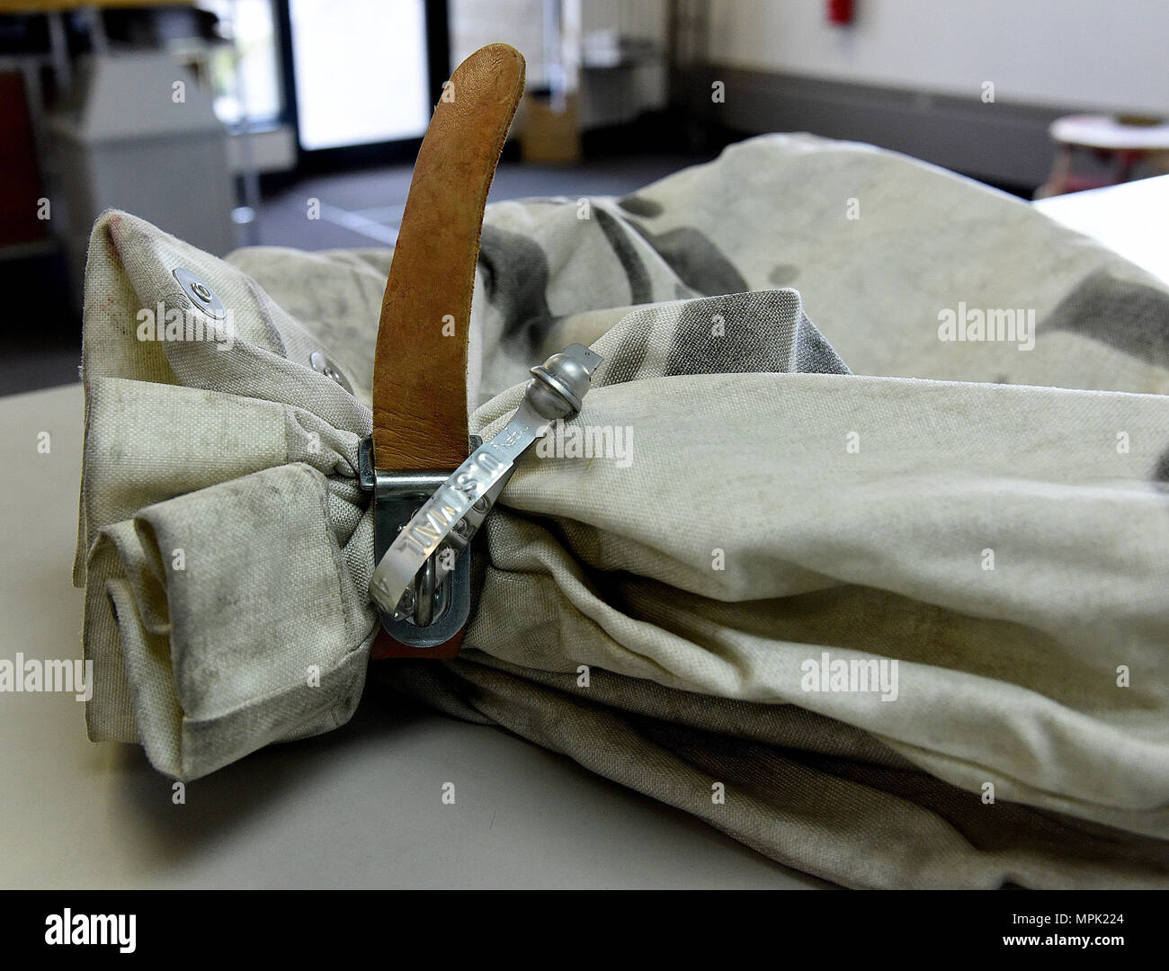 A registered mail sack is shown at the base contract postal unit March ...
