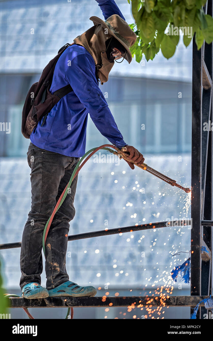 Oxy acetylene torch, cutting steel, Construction site, building site ...