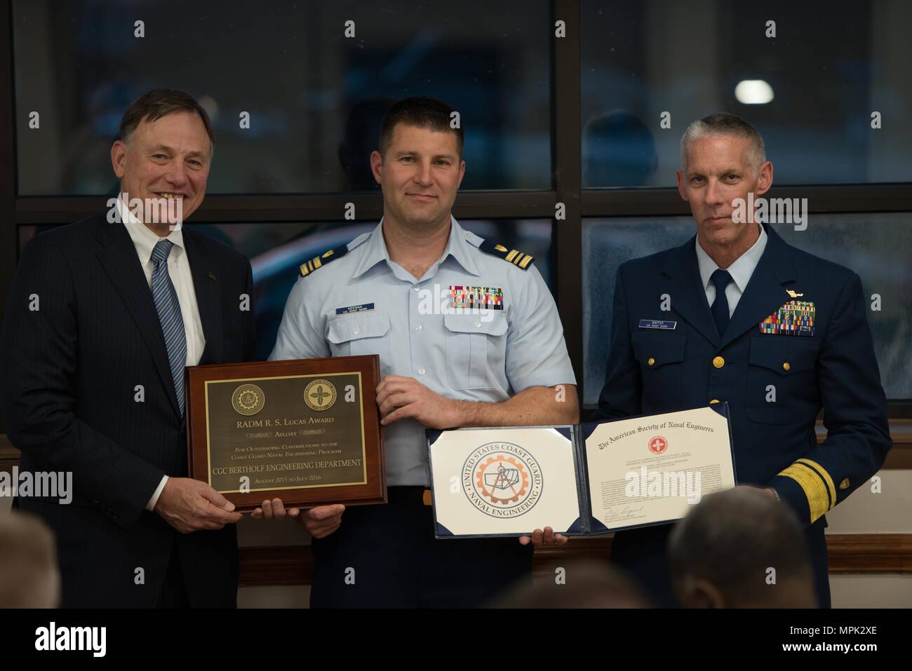 Coast Guard Lt. Cmdr. Kevin Keenan receives the 2016 Lucas Plaque ...