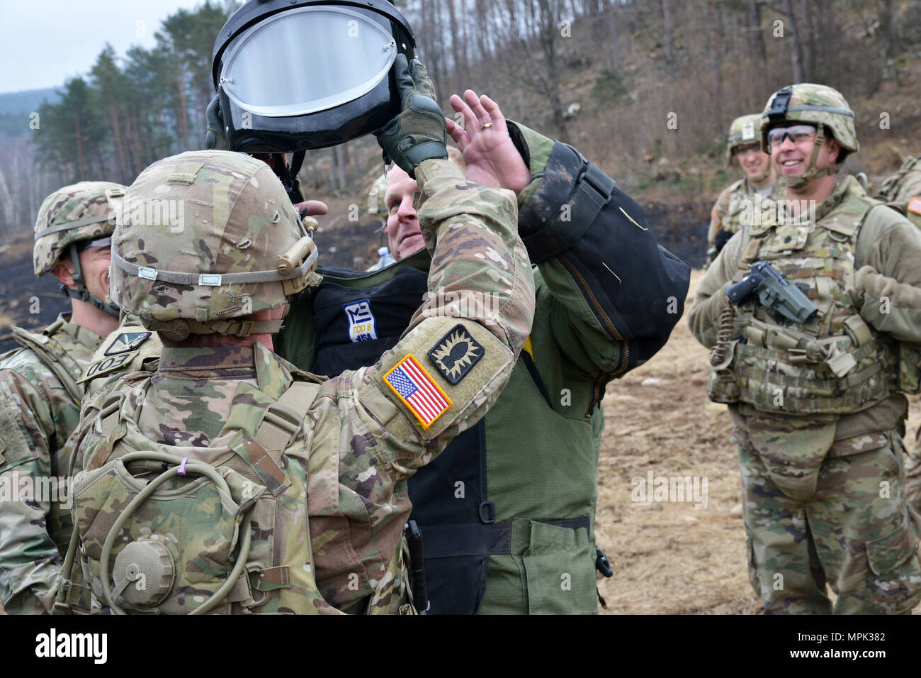 U.S. Army soldiers, assigned to the 16th Sustainment Brigade, assist ...