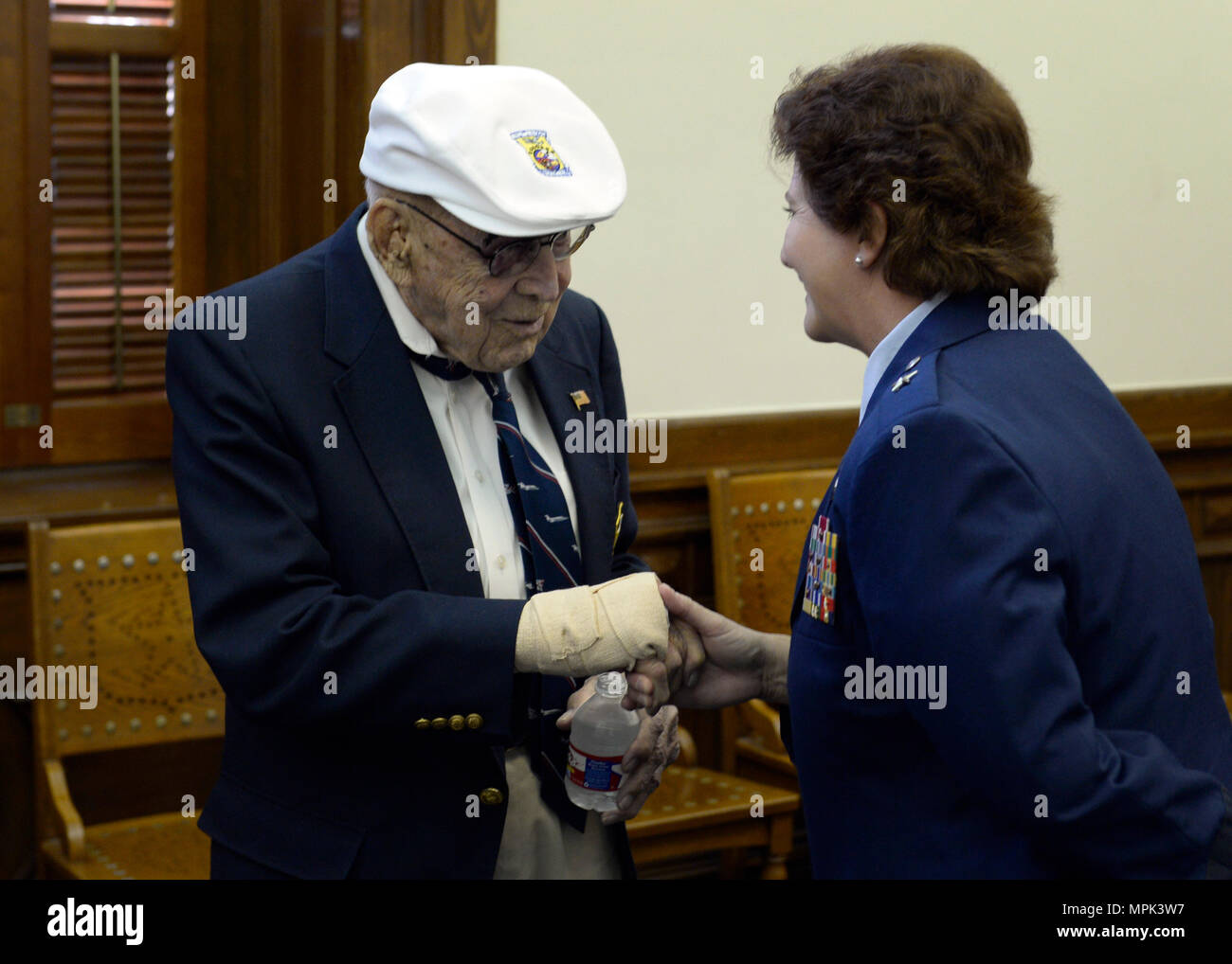 Retired Lt. Col. Dick Cole (left) visits with Brig. Gen. Dawn M ...