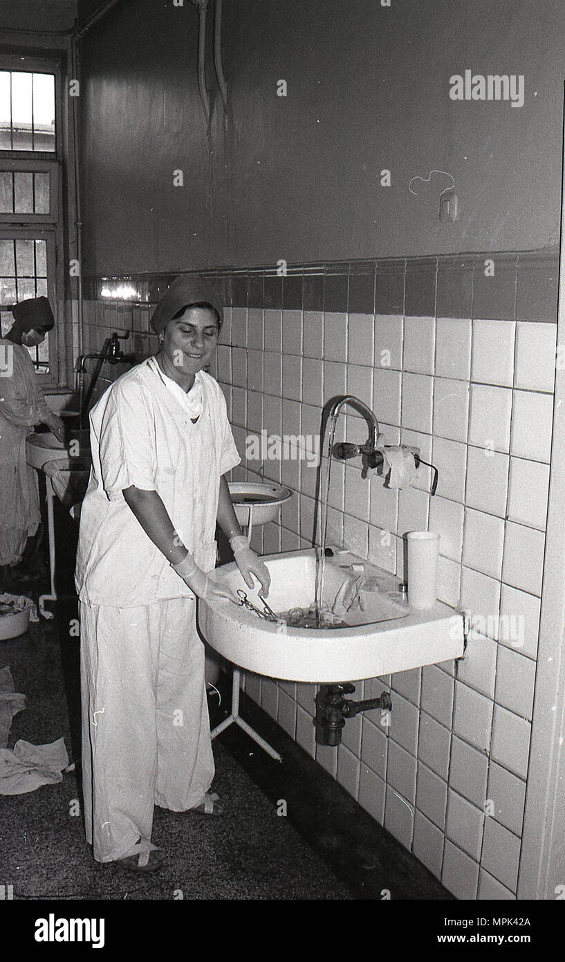 DOCTOR WASHING SURGICAL EQUIPMENT Stock Photo - Alamy