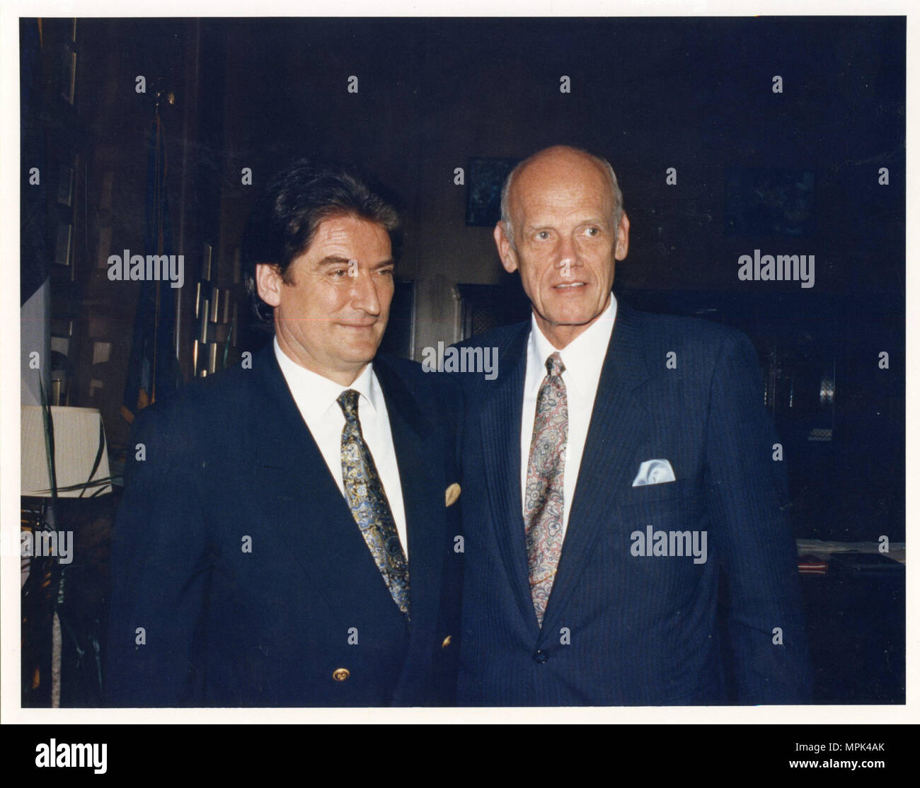 TWO MEN TAKING A PHOTO Stock Photo - Alamy