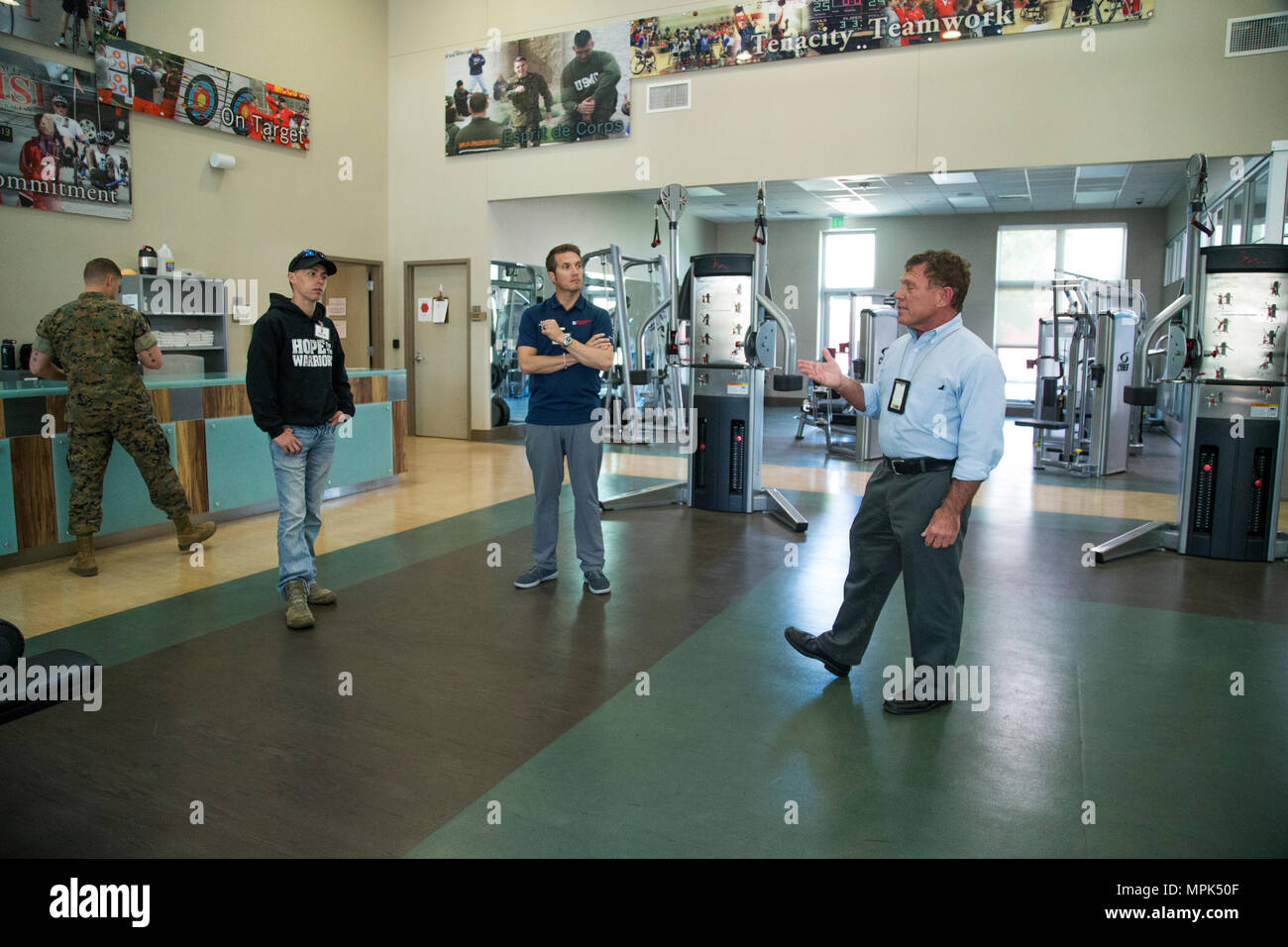 Paul Swanson, right, the Command Advisor of Wounded Warrior Battalion ...