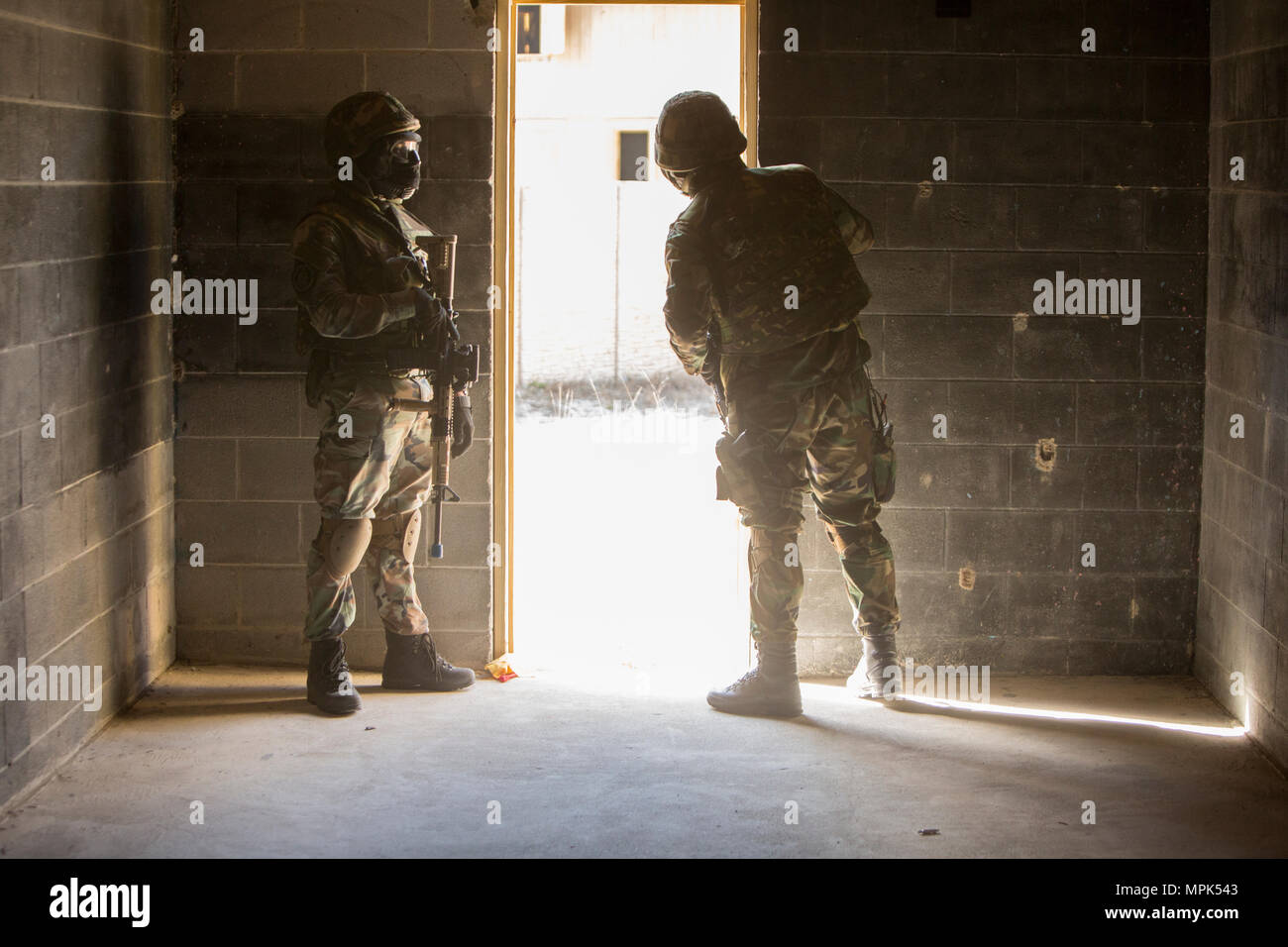 Royal Netherlands Marines with the Dutch Caribbean Forces observe their ...