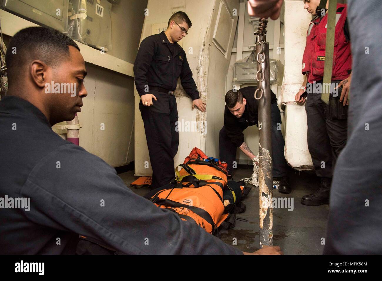 170320-N-KJ380-109 ATLANTIC OCEAN (March 20, 2017) Sailors transport a ...