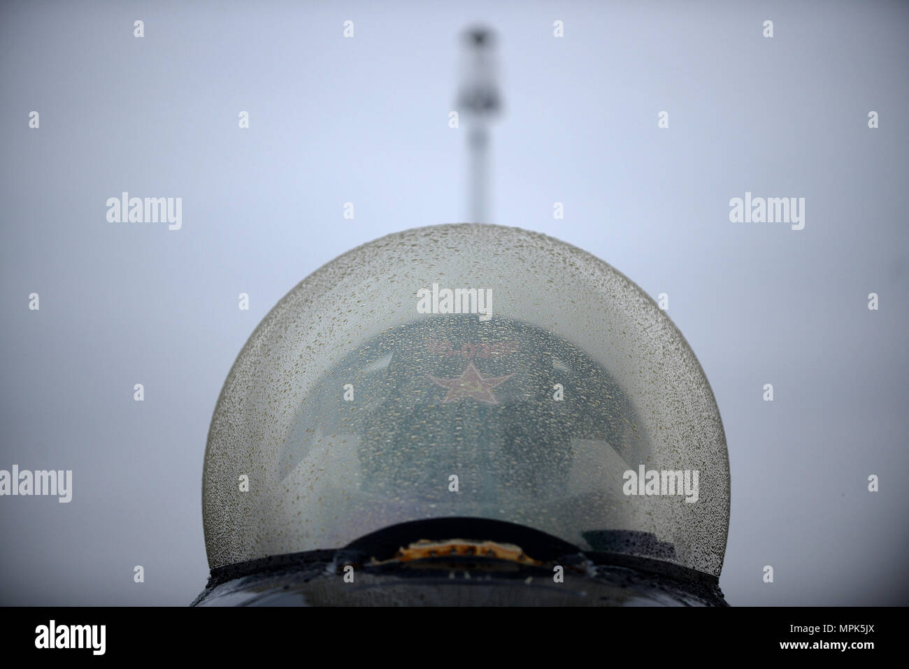 Raindrops litter the canopy of an F-16 Fighting Falcon at Royal ...