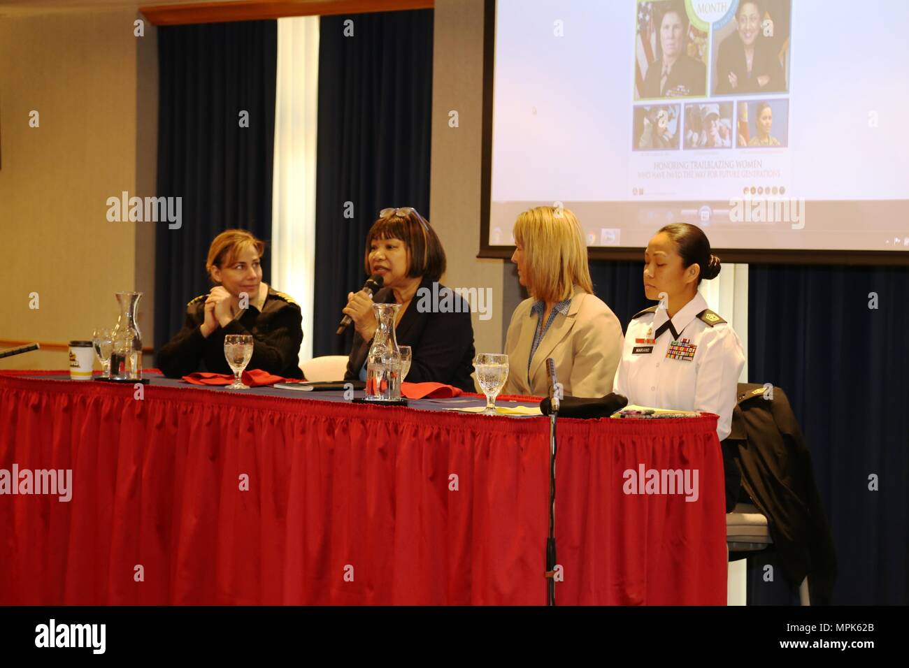 A guest speaker panel comprising (left to right) Capt. Kimberly ...