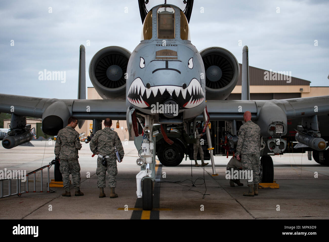 Airmen from a Wing Inspection Team, left, and Tech. Sgt. Chase Williams ...
