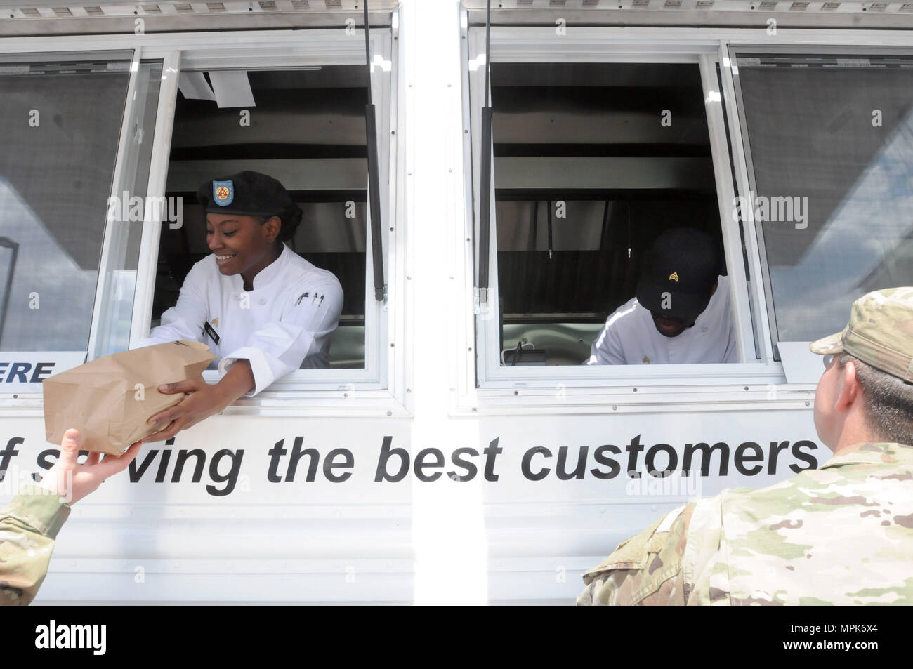Sgt. Vantayshia Jones (left), of Killeen, Texas, a culinary ...