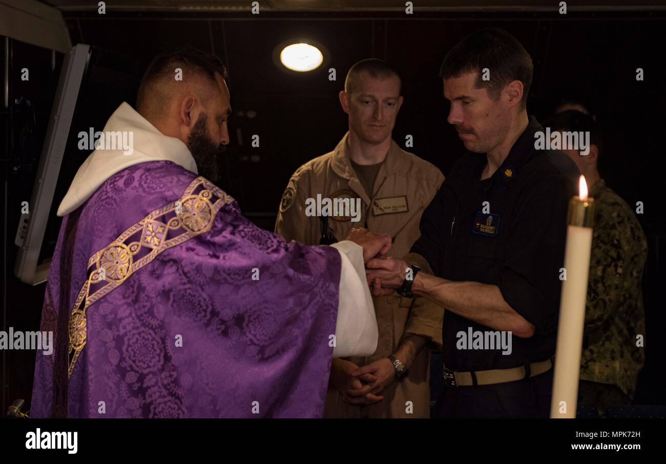 170322-N-KB401-027 ARABIAN GULF Father Jean Michel Rous, the chaplain ...
