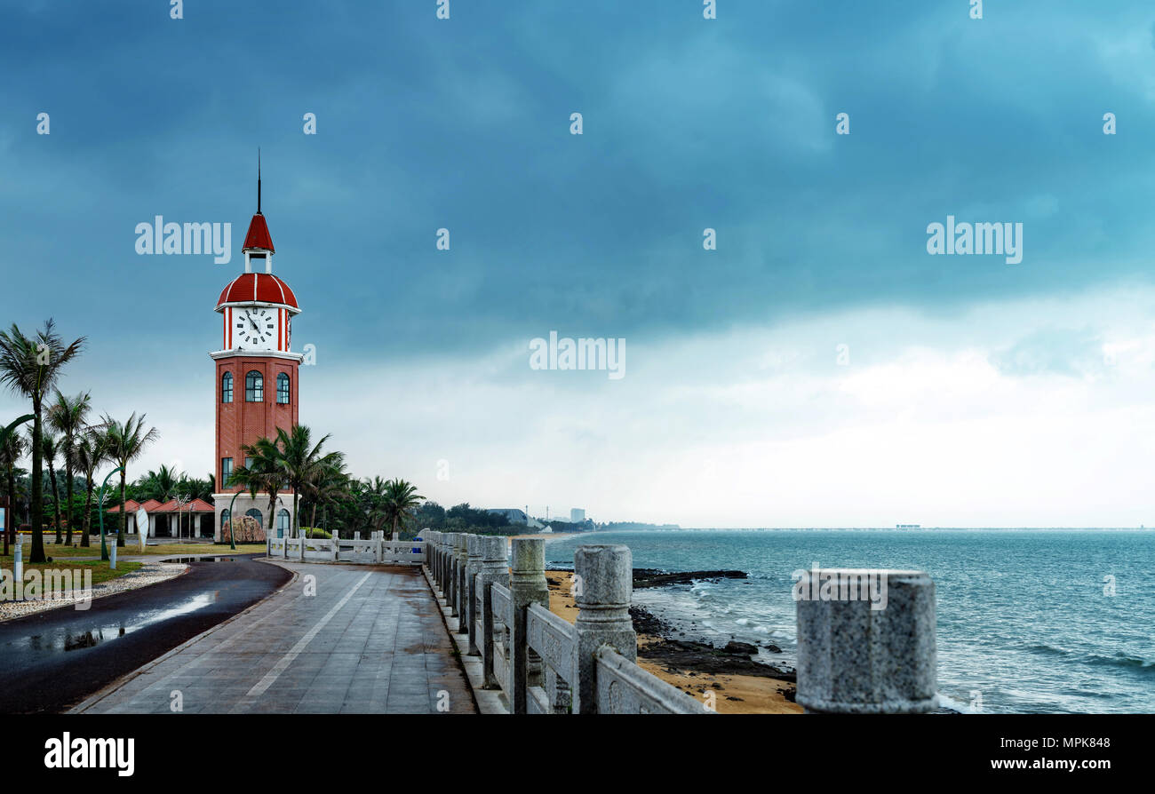 The ancient bell tower located on the coastline, Haikou, Hainan, China ...