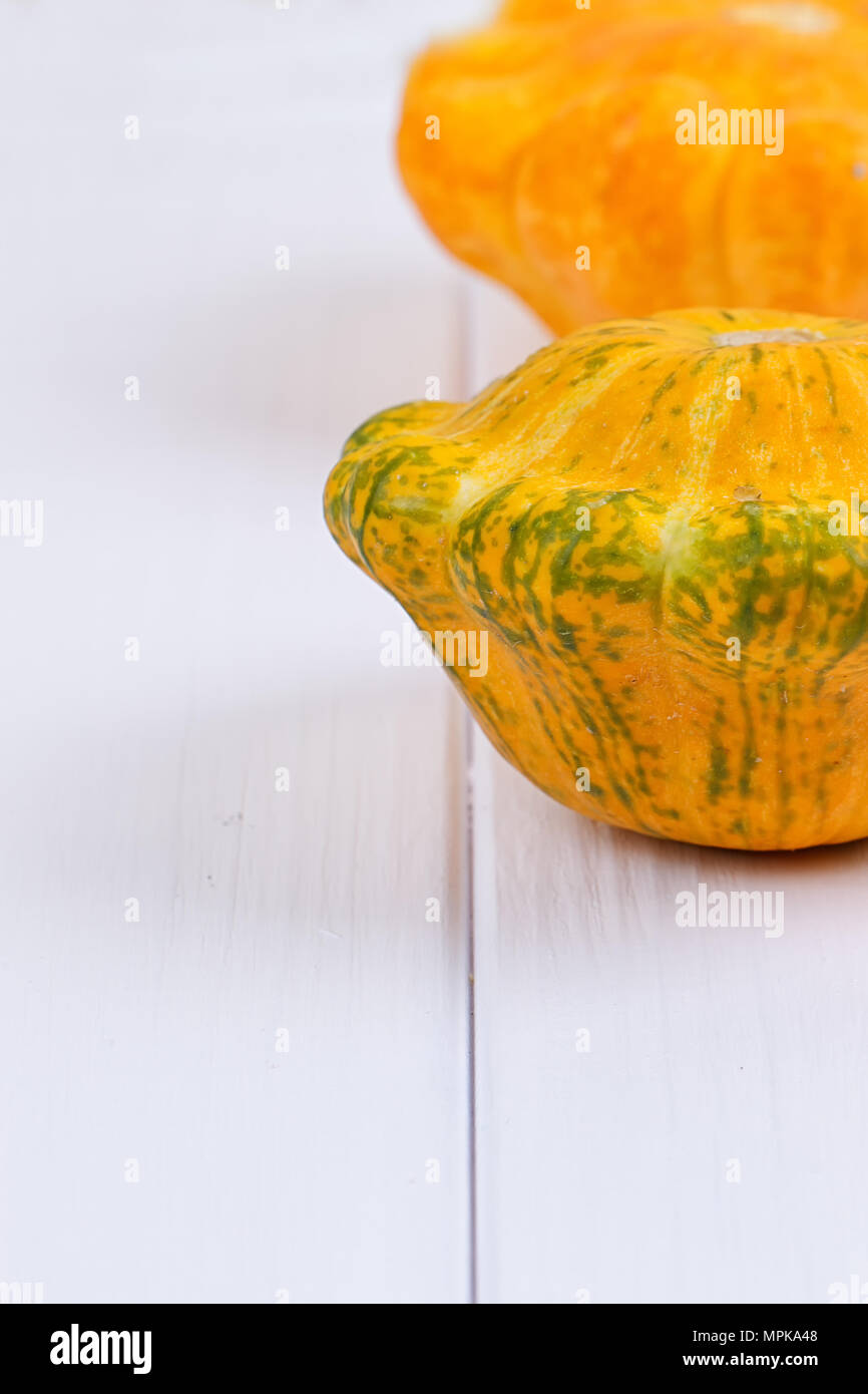 Group of autumn squash over a white background Stock Photo - Alamy