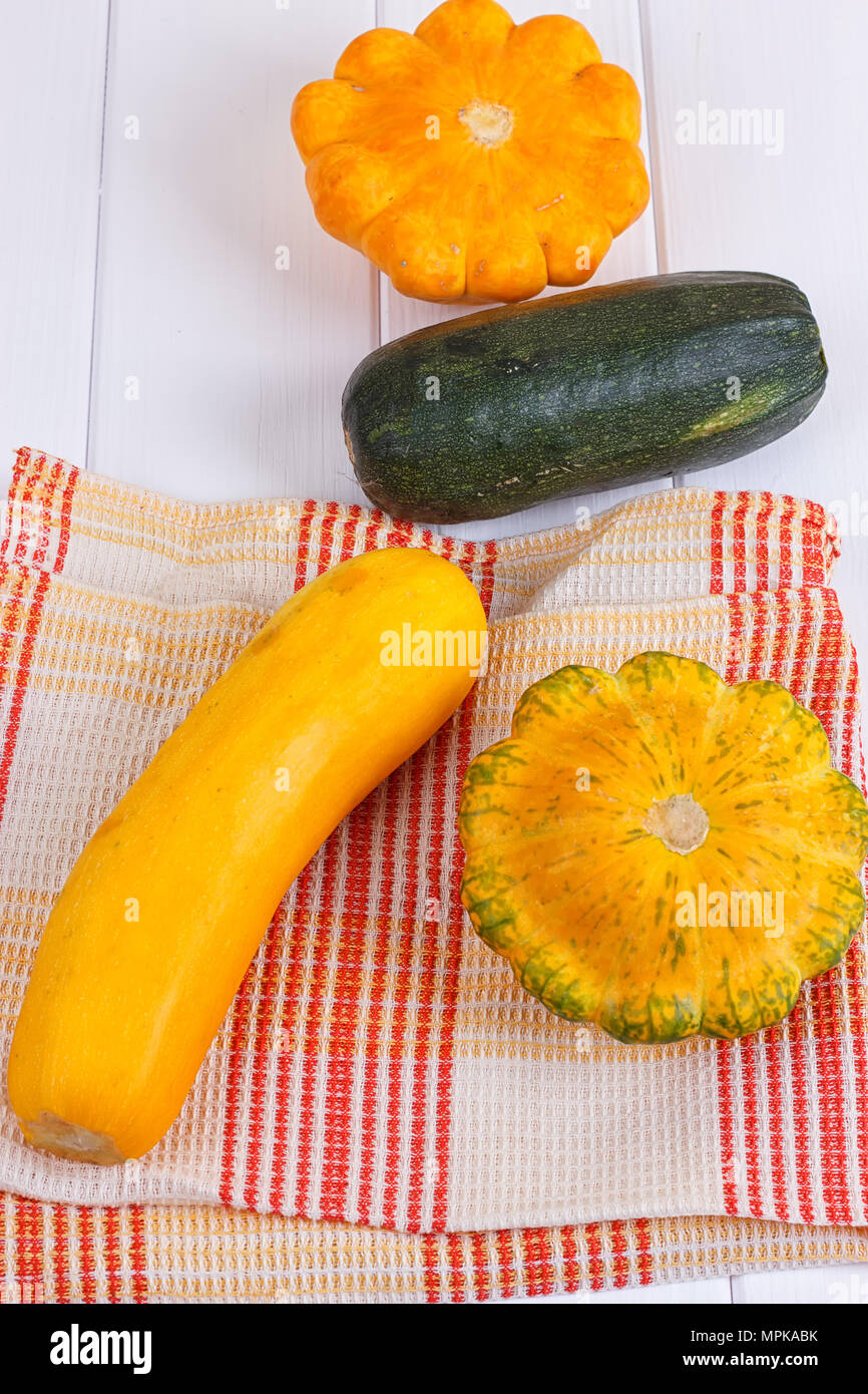 Autumn squash and zucchini on a table cloth Stock Photo - Alamy