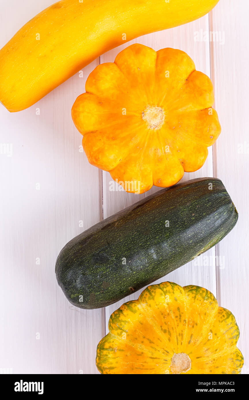 Group of autumn squash over a white background Stock Photo - Alamy