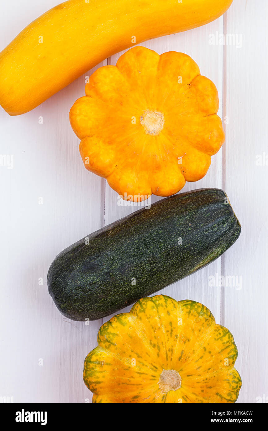 Group of autumn squash over a white background Stock Photo - Alamy