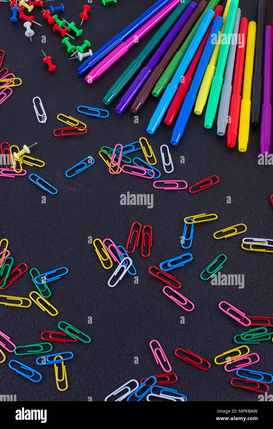 Material for school, paper clips, pencils colors Stock Photo - Alamy