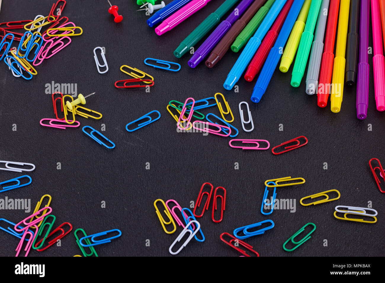 Material for school, paper clips, pencils colors Stock Photo - Alamy