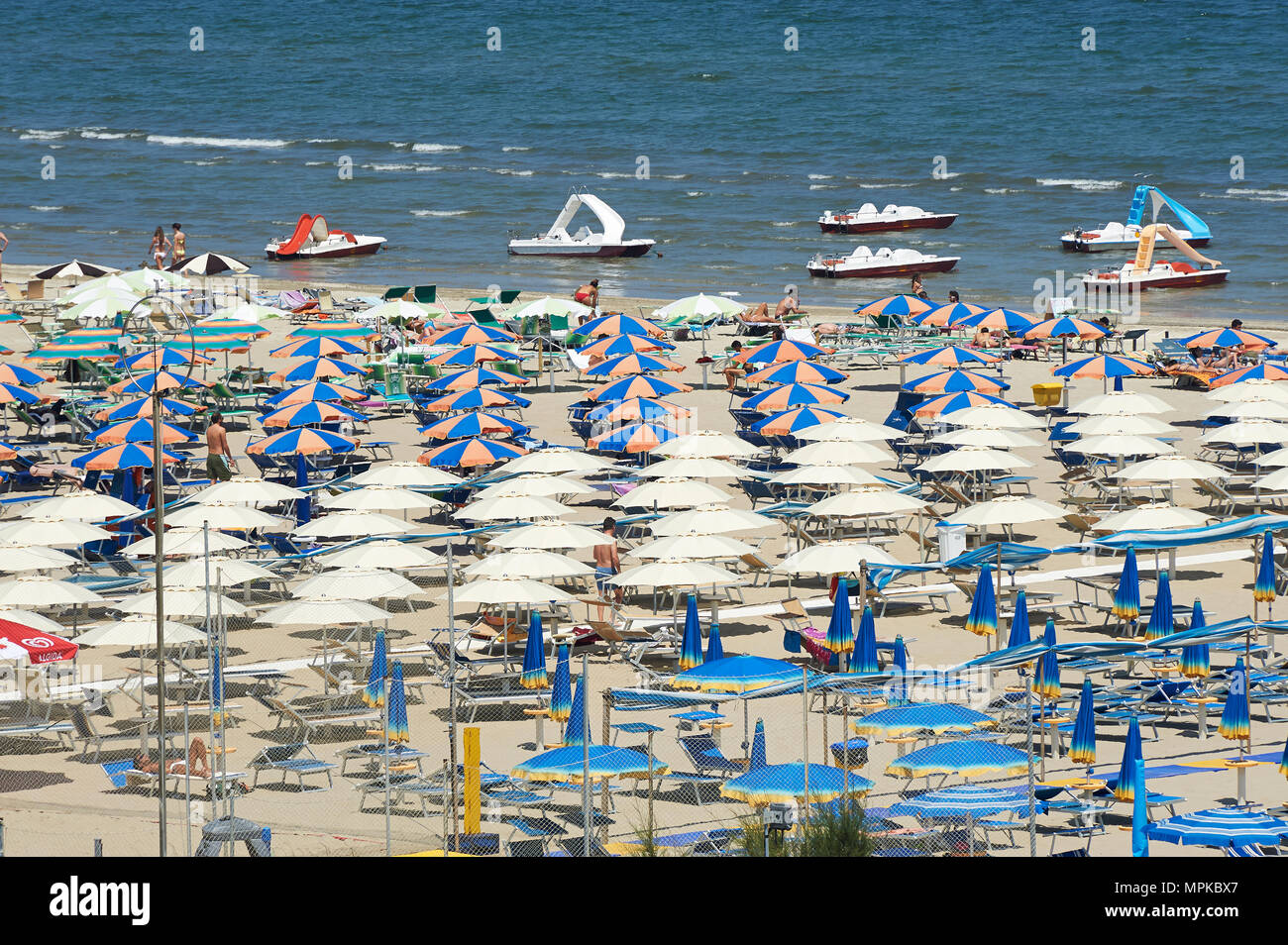 Cervia (Ra),Italy, the beach with the umbrellas Stock Photo - Alamy