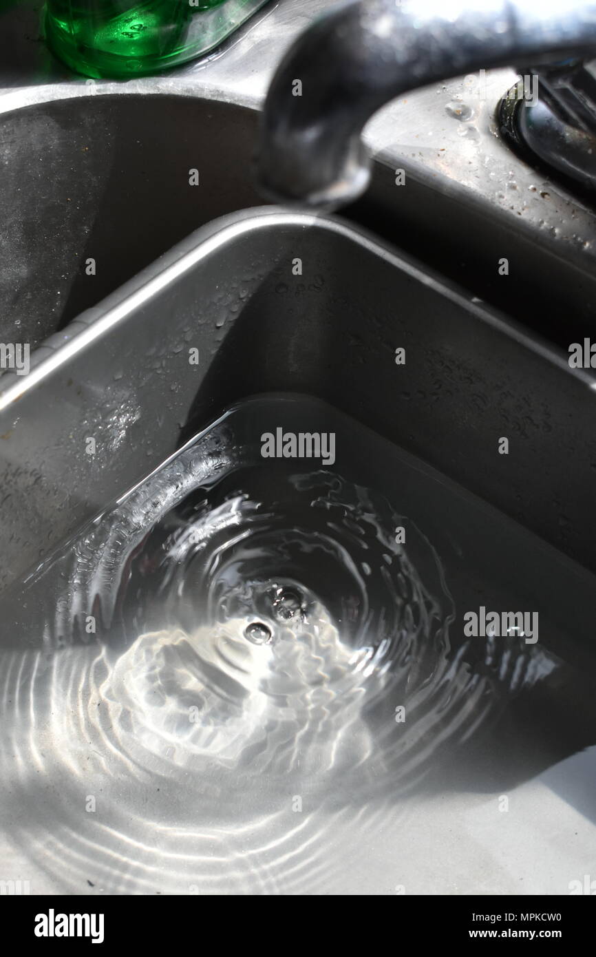 Dripping tap stock Stock Photo - Alamy