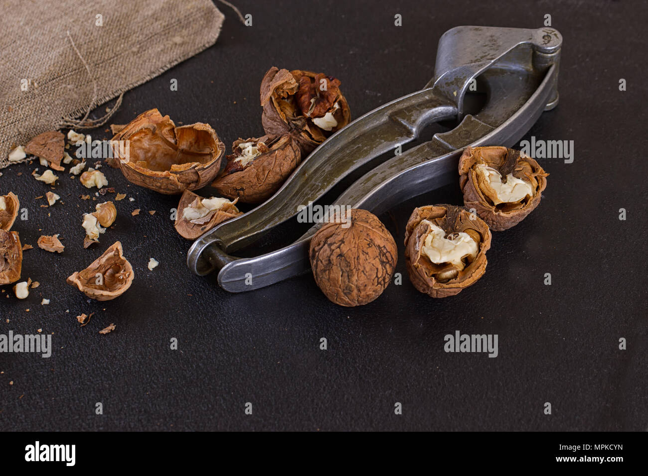 Greek nuts whole and split and the Nutcracker Stock Photo - Alamy