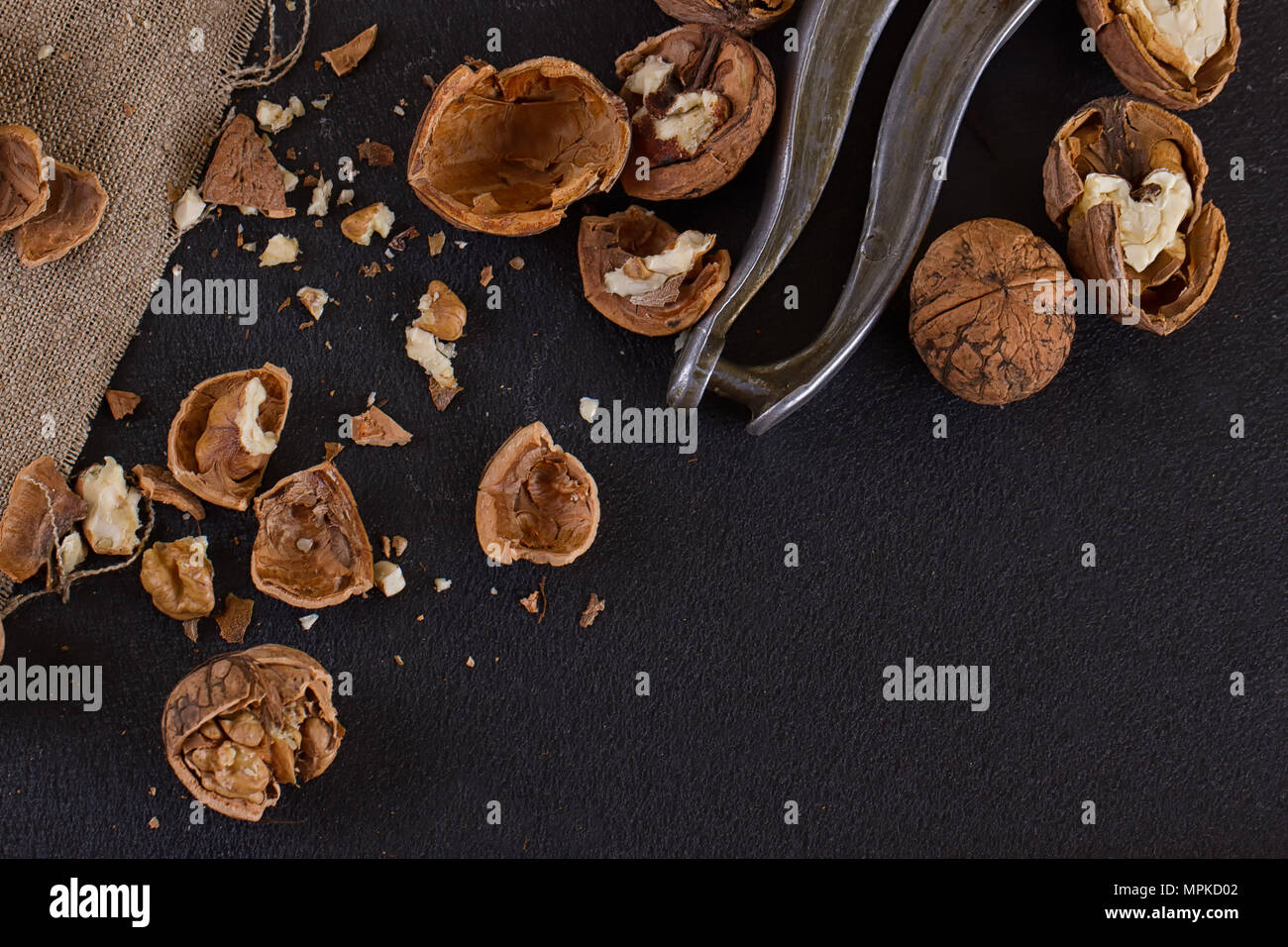 Greek nuts whole and split and the Nutcracker Stock Photo - Alamy