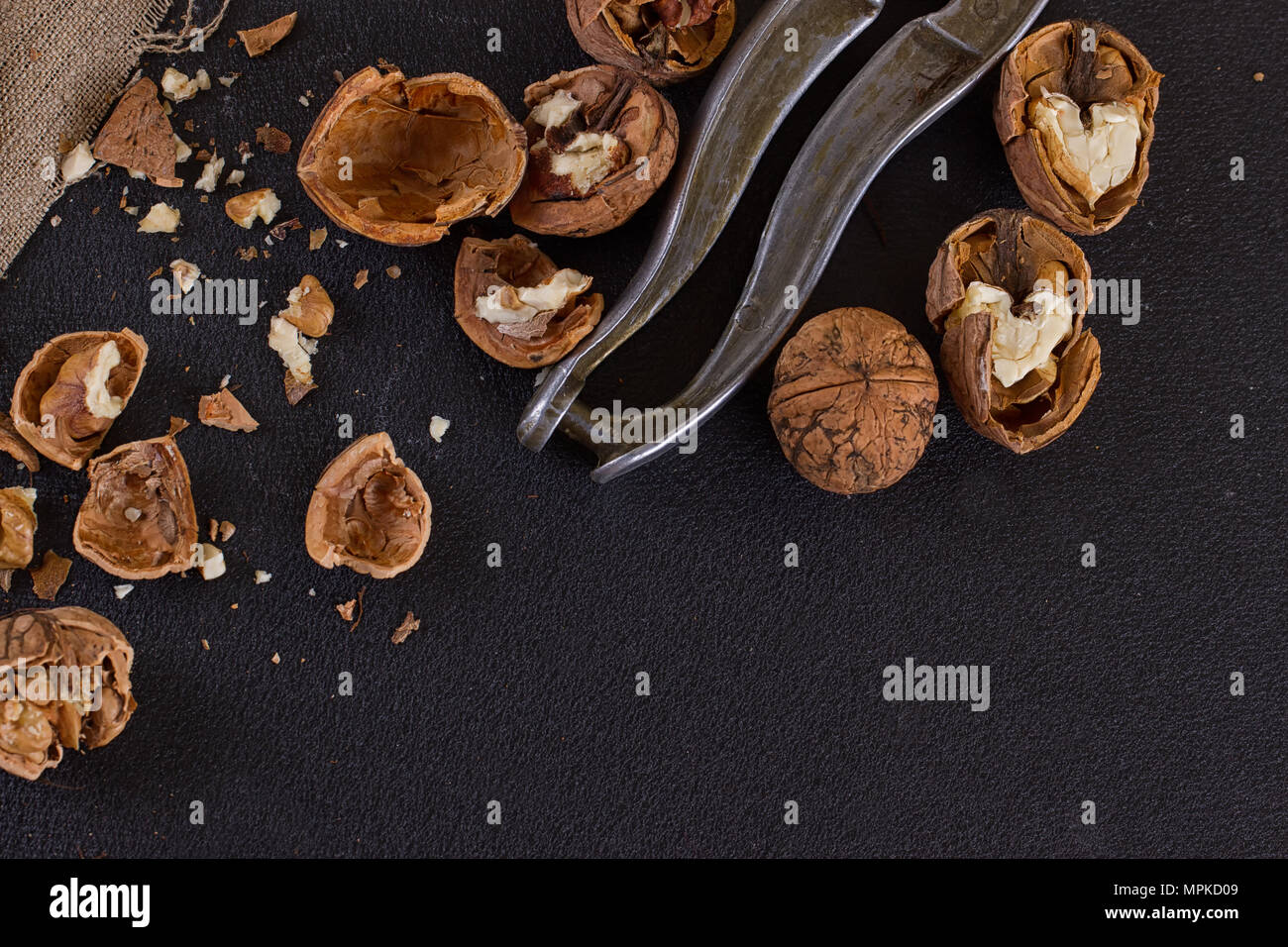 Greek nuts whole and split and the Nutcracker Stock Photo - Alamy