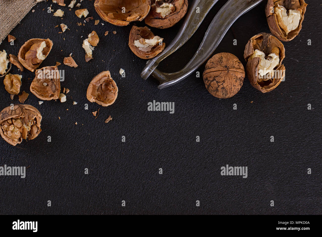 Greek nuts whole and split and the Nutcracker Stock Photo - Alamy