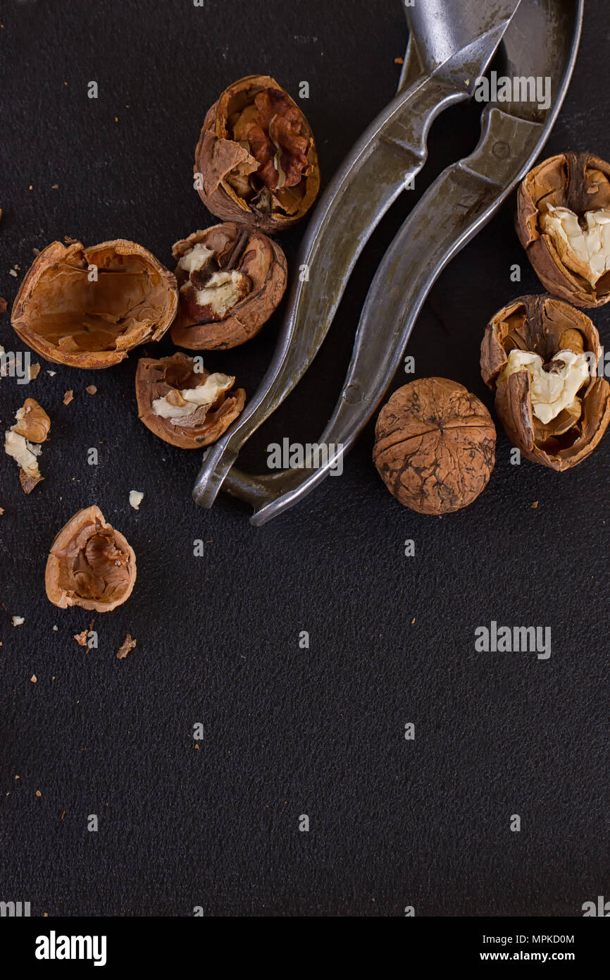 Greek nuts whole and split and the Nutcracker Stock Photo - Alamy