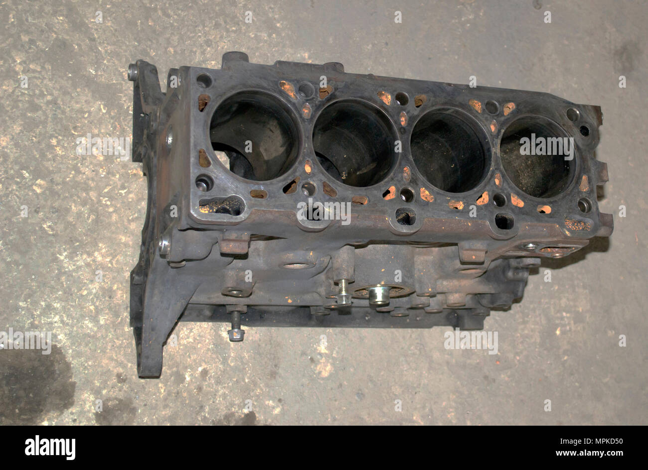 Disassembled diesel engine for repair. The cylinder block is clean ...