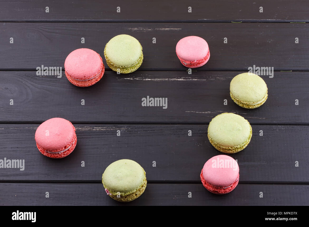 Macaron on black with Copy space, From above Stock Photo - Alamy