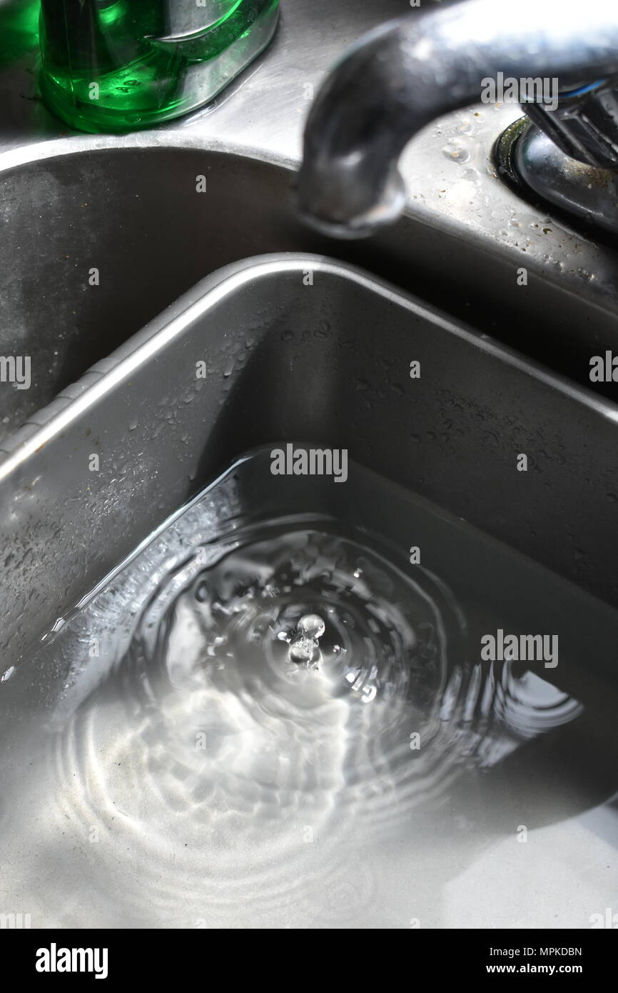 Dripping tap stock Stock Photo - Alamy