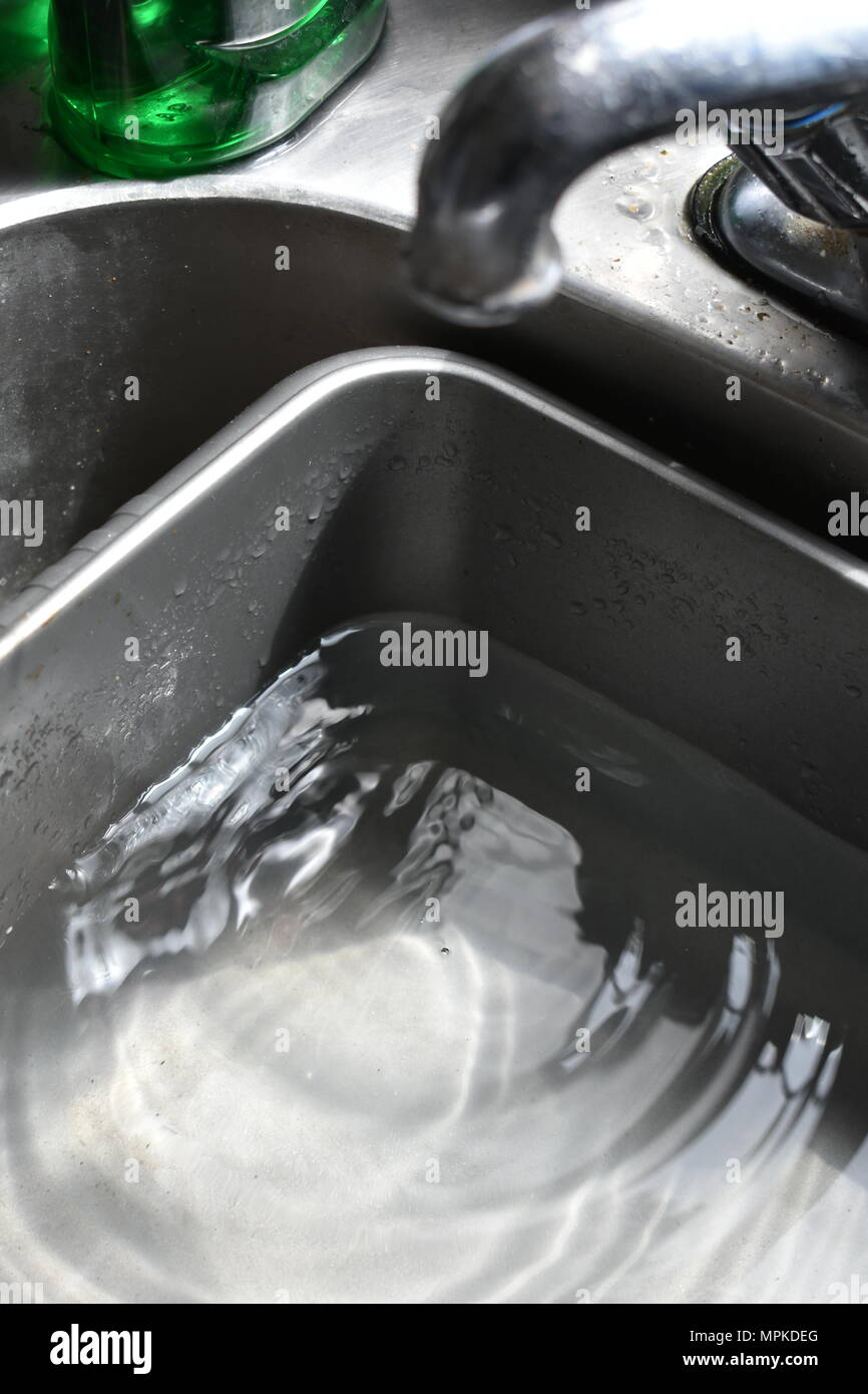 Dripping tap stock Stock Photo - Alamy