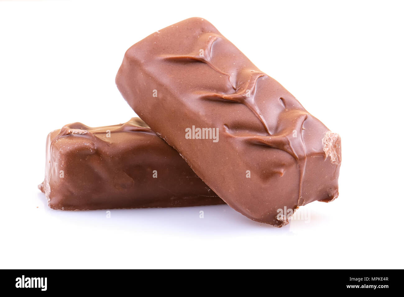 Chocolate bar with caramel isolated on white Stock Photo - Alamy