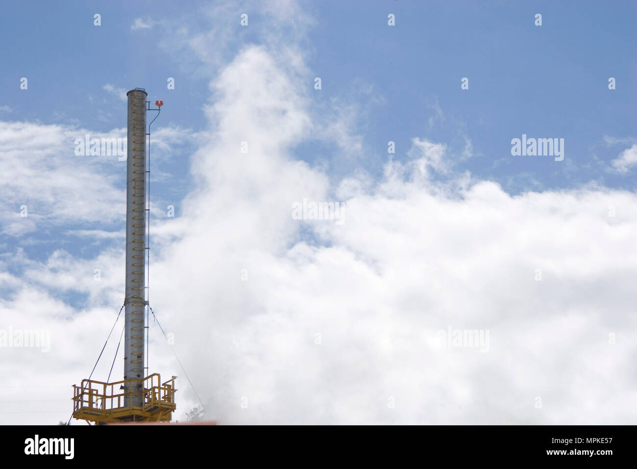 Steam Rises From A Smokestack On a Factory Stock Photo - Alamy