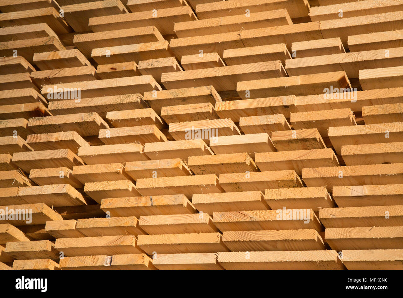 Stack of new wooden studs at the lumber yard Stock Photo - Alamy
