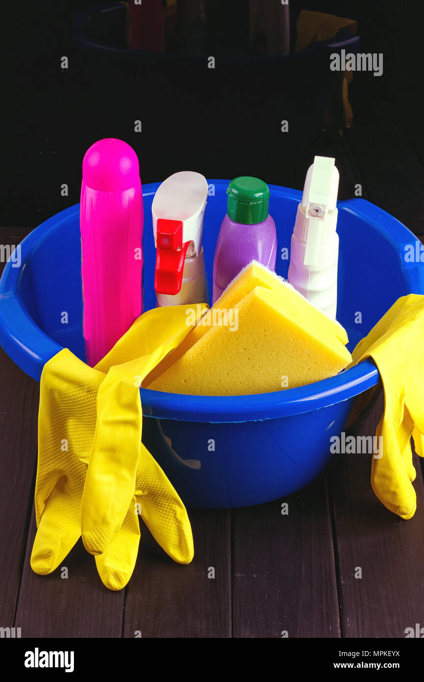 Cleaning items in bucket isolated on black Stock Photo - Alamy