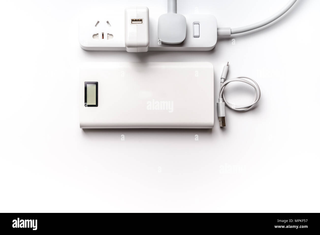 socket plug electric power bank and wire white color isolate. save ...