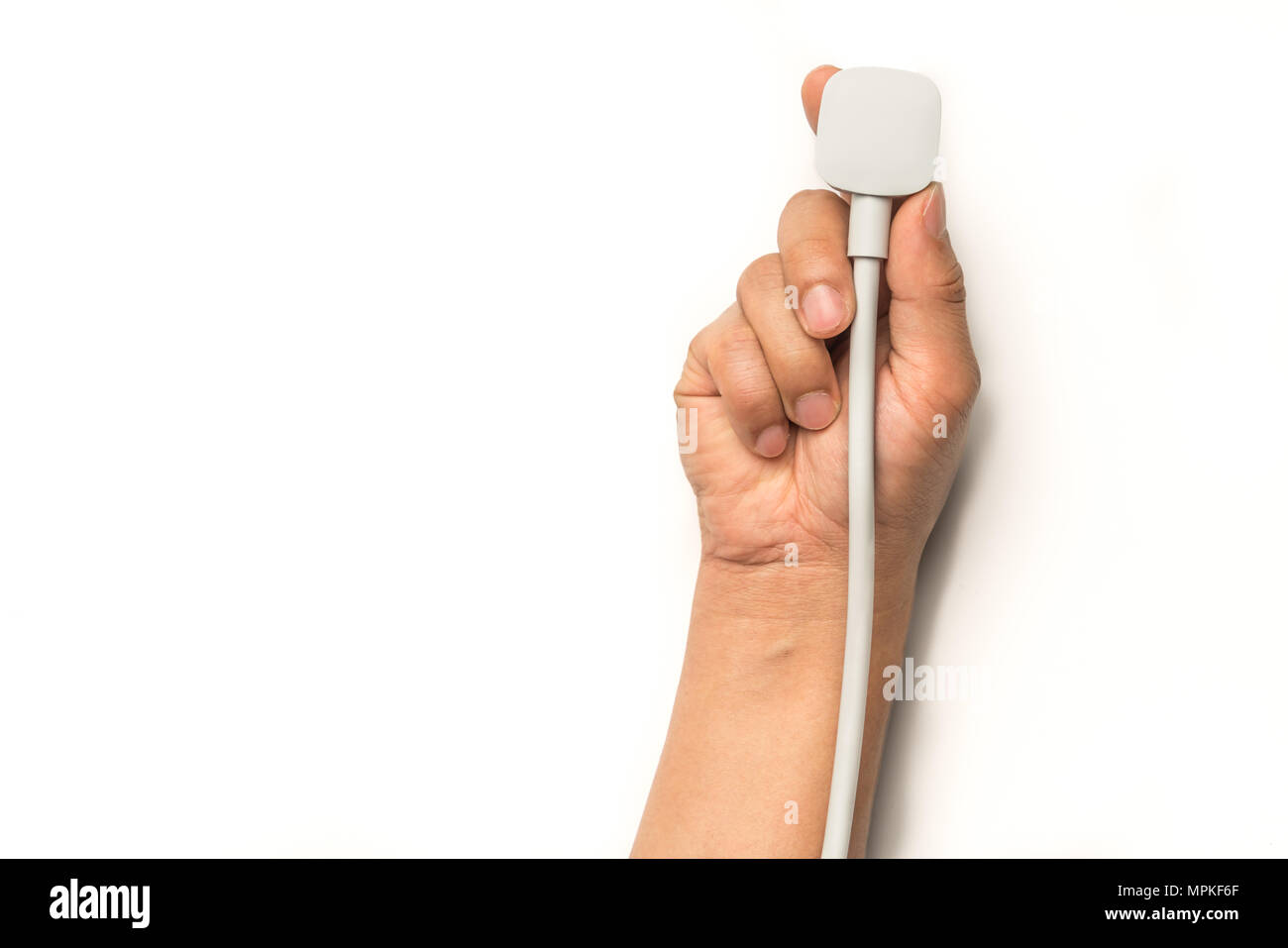 hand hold plug electric power white color wire. save energy and reduce ...