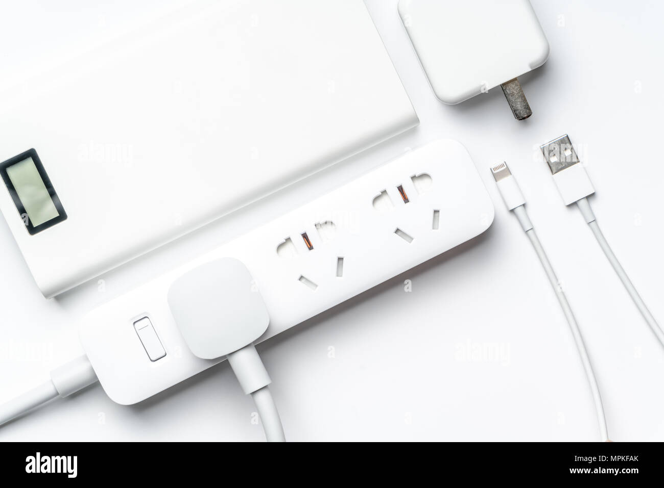socket plug electric power bank and wire white color isolate. save ...