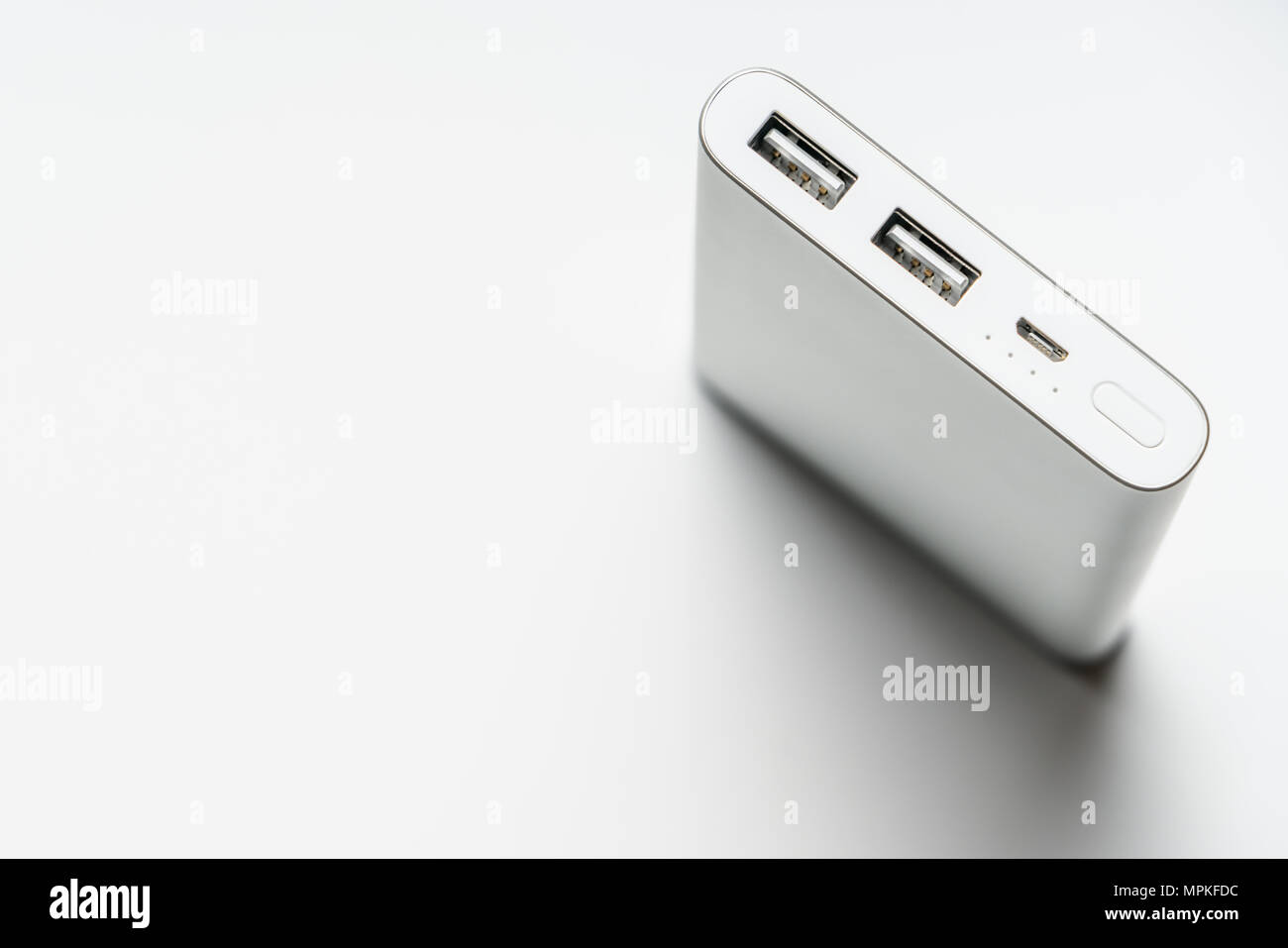 white silver power bank isolate. save energy and reduce energy ...