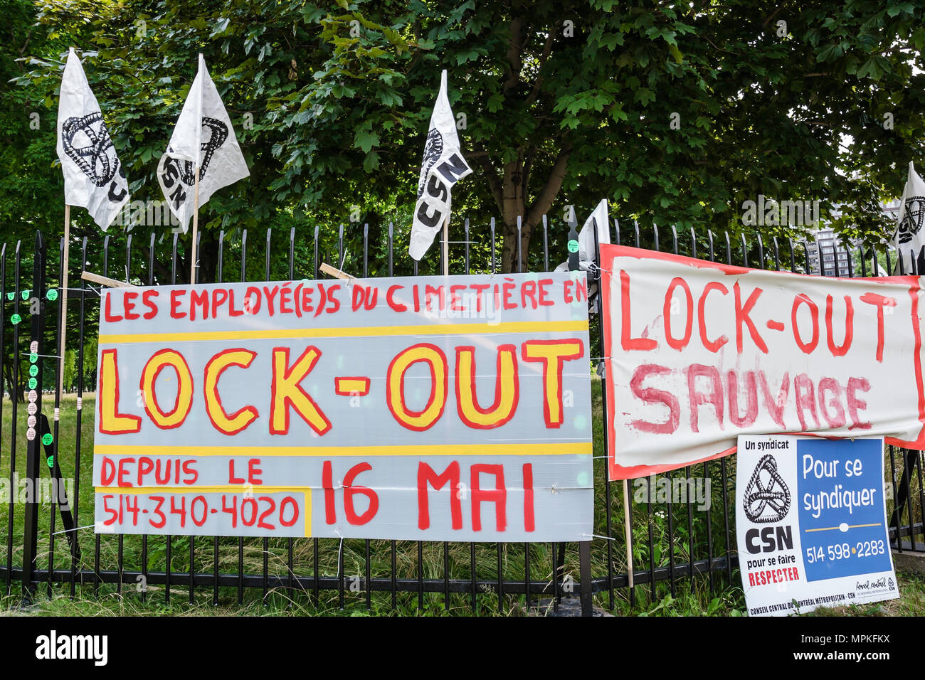 Montreal Canada,Quebec Province,signs,cemetery employee lock out strike ...