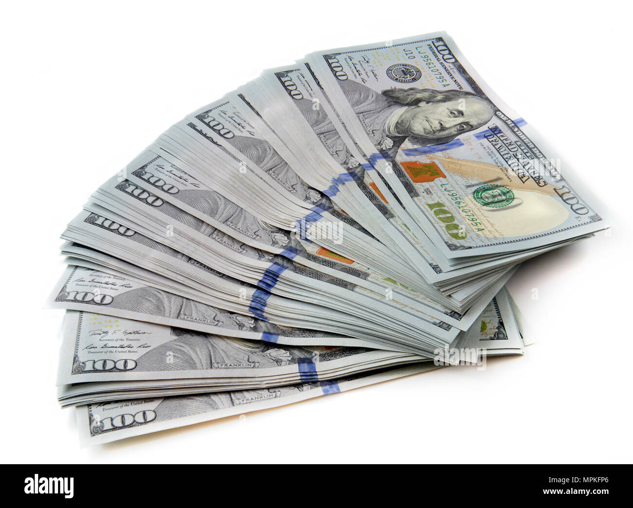 New banknotes of dollars on a white background Stock Photo - Alamy