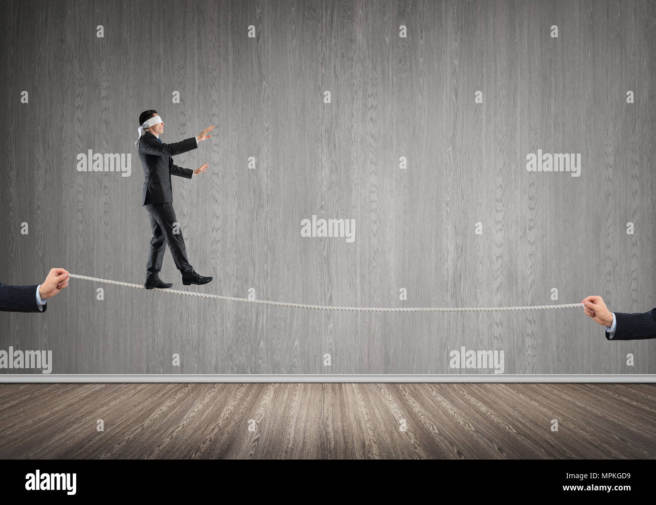 Business concept of risk support and assistance with man balancing on ...