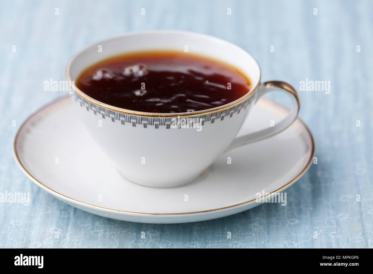 nice cup of coffee in an antique cup Stock Photo - Alamy